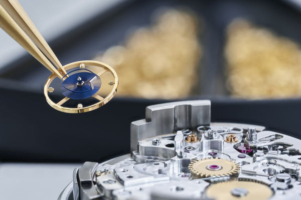 The Precision and Reliability of the Variable-Inertia Balance Wheel in